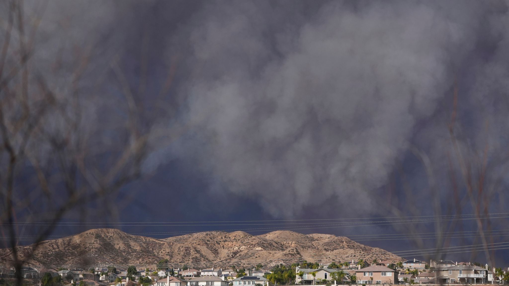 California wildfires: More than 30,000 flee as fire erupts north of Los ...