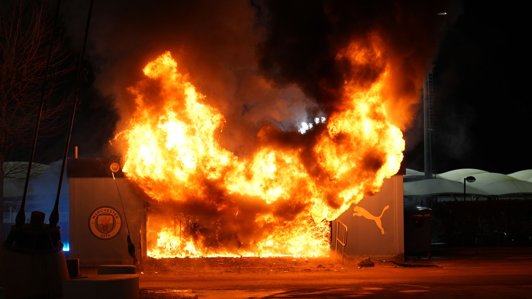 Merchandise stand catches fire outside Manchester City's stadium ahead ...