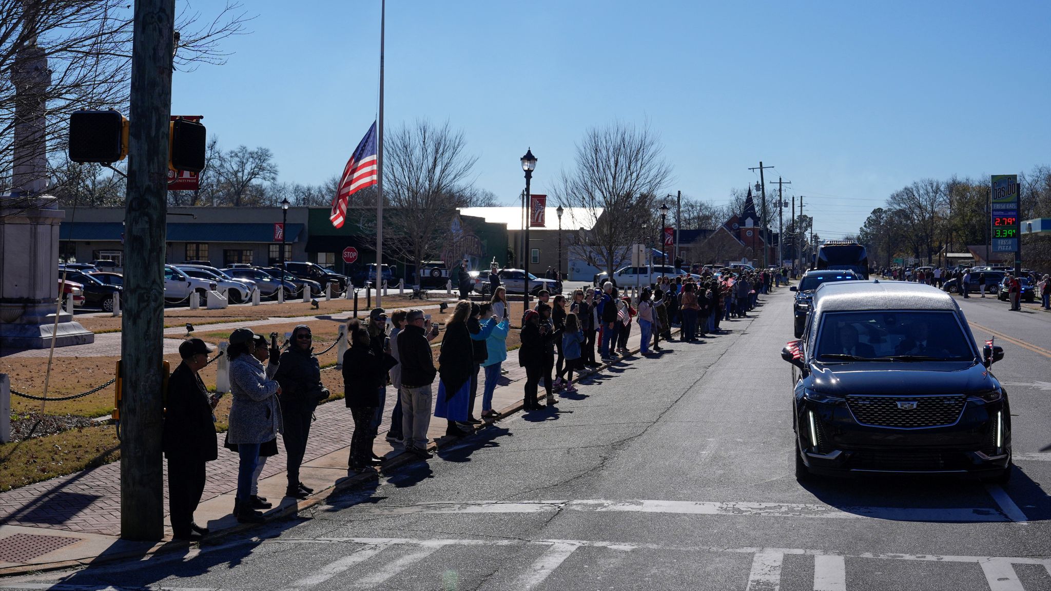Jimmy Carter: Former US president's six-day state funeral starts with procession - as mourners ...