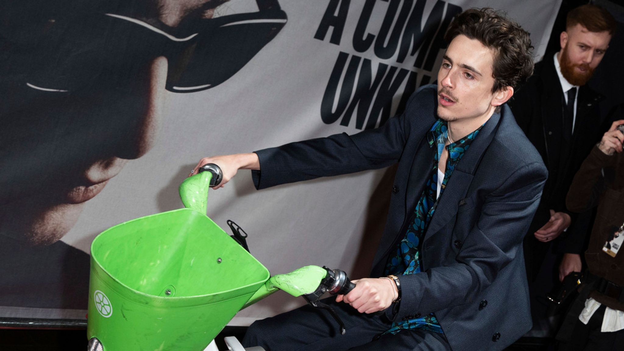 Timothee Chalamet rides Lime bike at London premiere of Bob Dylan biopic | Ents & Arts News ...
