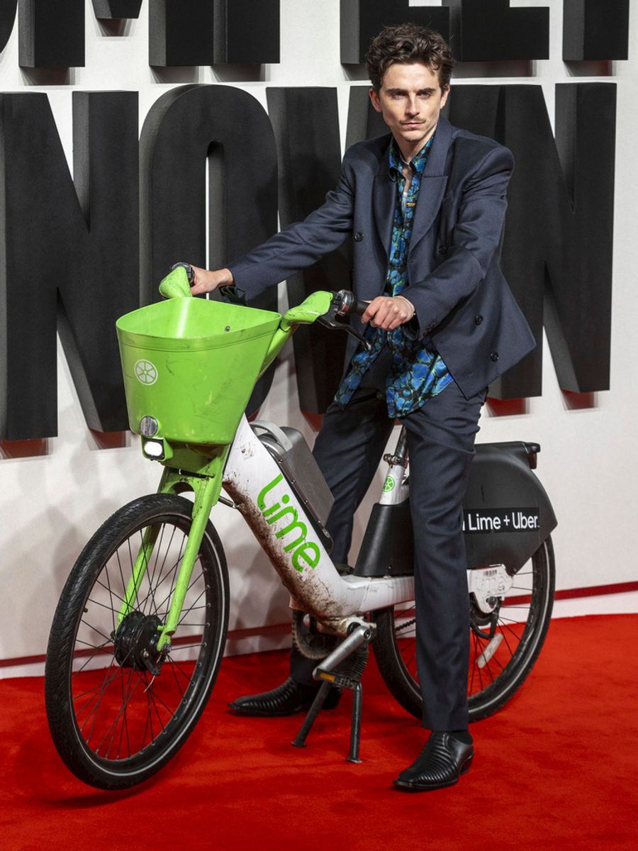 Timothee Chalamet rides Lime bike at London premiere of Bob Dylan biopic | Ents & Arts News ...