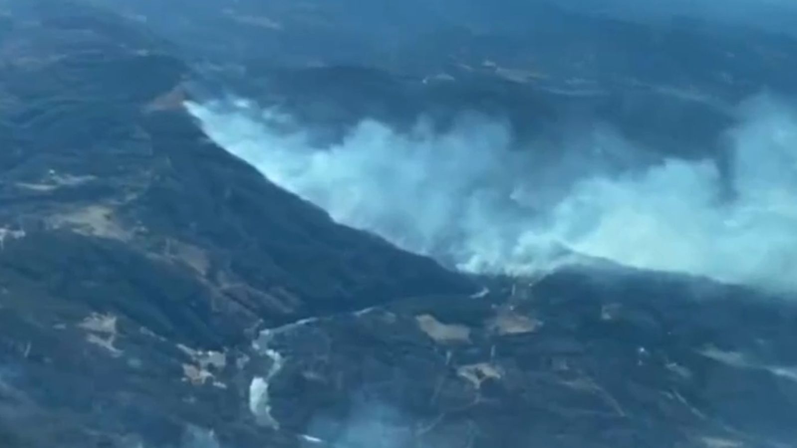 Watch: Chilean army flies over wildfires in Chile | World News | Sky News