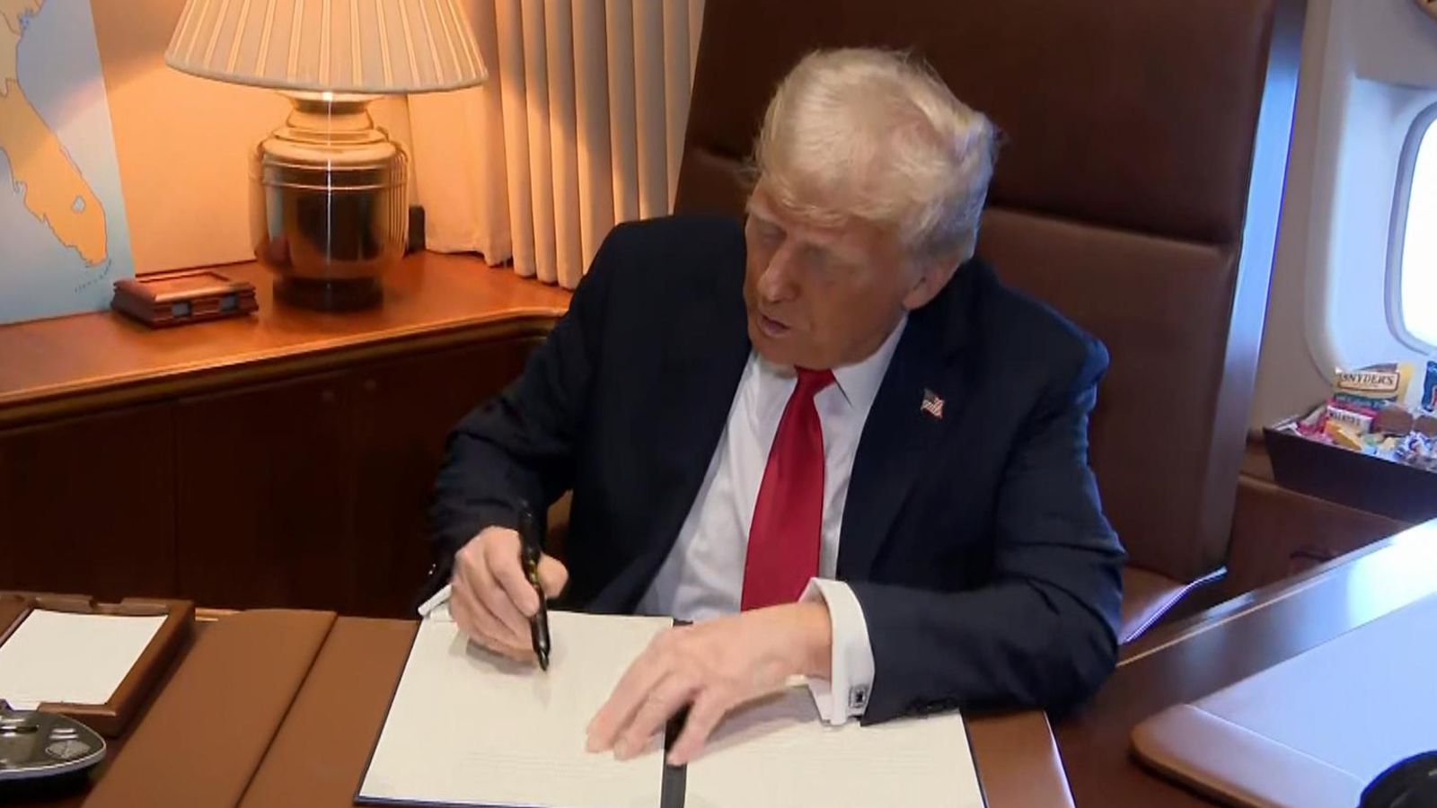 Donald Trump signs 'Gulf of America Day' executive order while flying ...