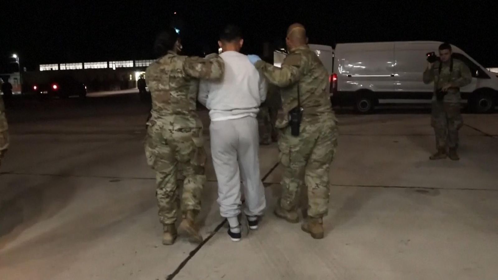 First military flight lands in Guantanamo Bay with migrants deported ...
