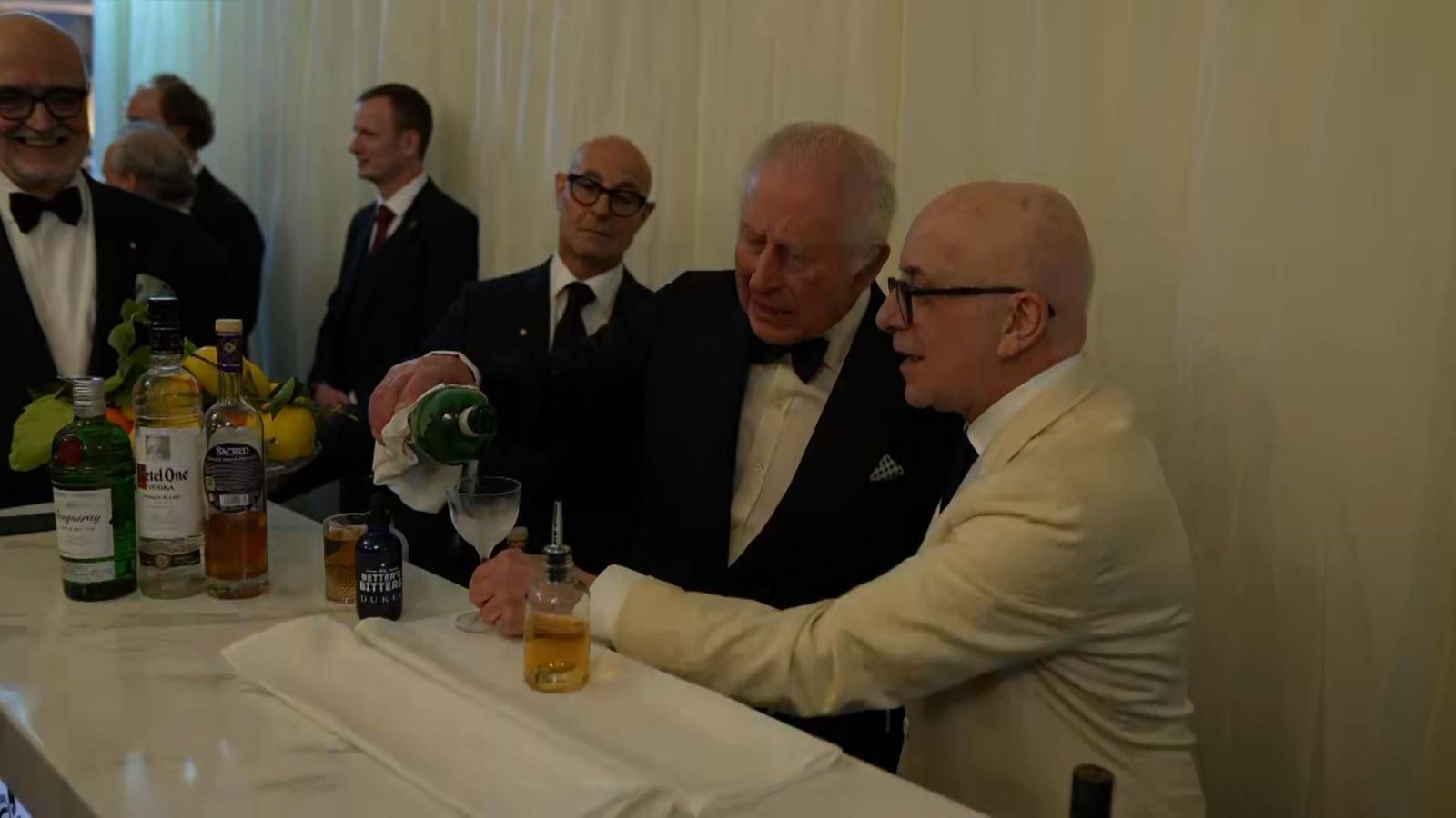 King Charles makes drink with Stanley Tucci during celebration dinner ...