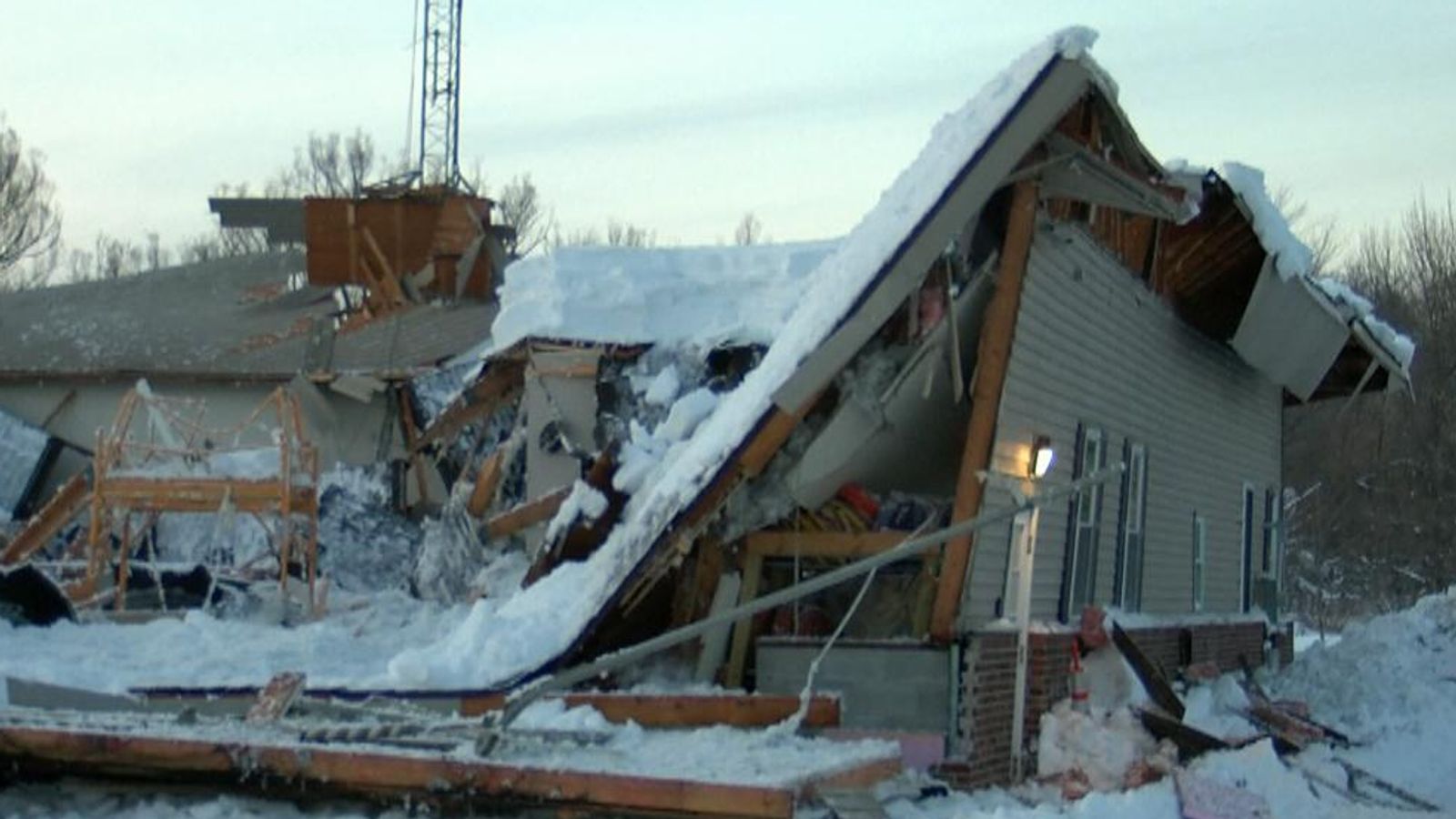 Fire station collapses under weight of snow in New York | US News | Sky ...