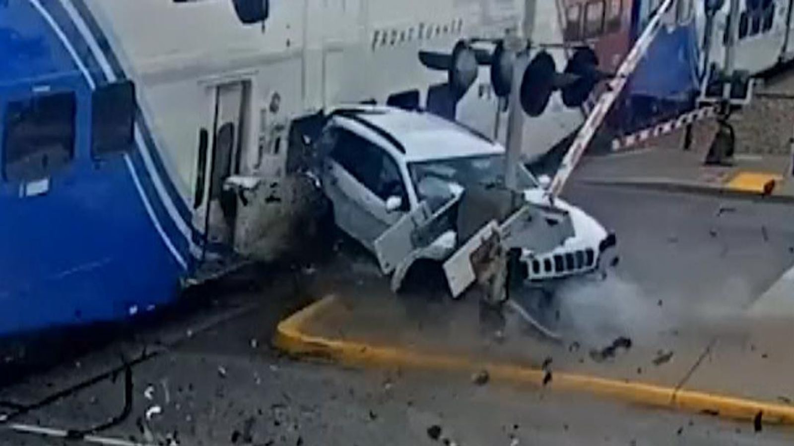 CCTV: Lucky escape as train smashes into car on crossing moments after ...