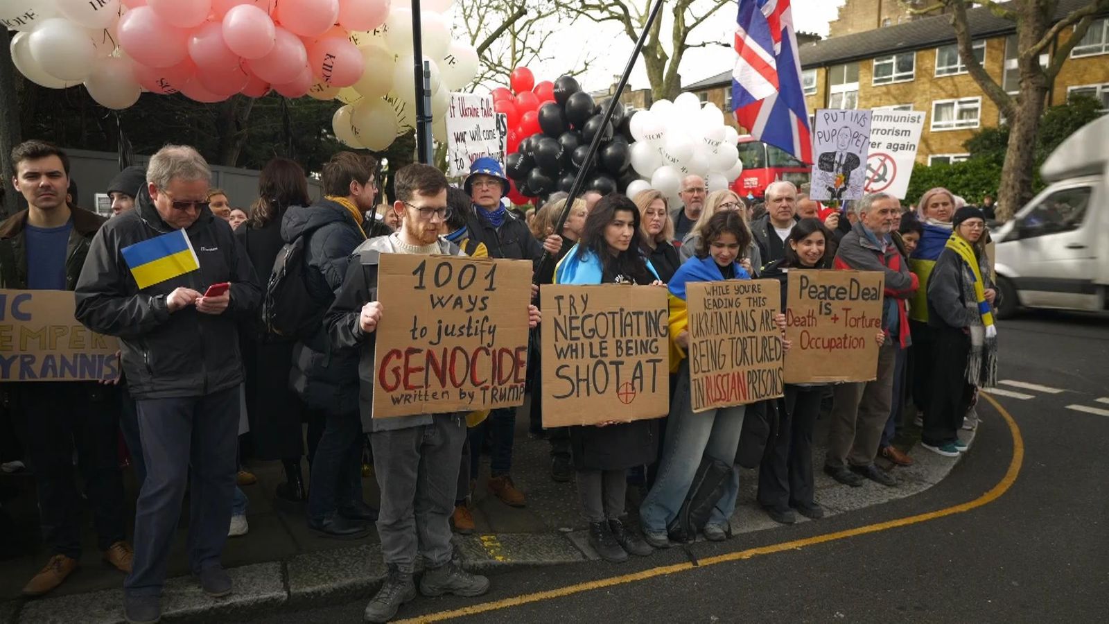 Thousands march on Russia's London embassy to mark three years of war ...