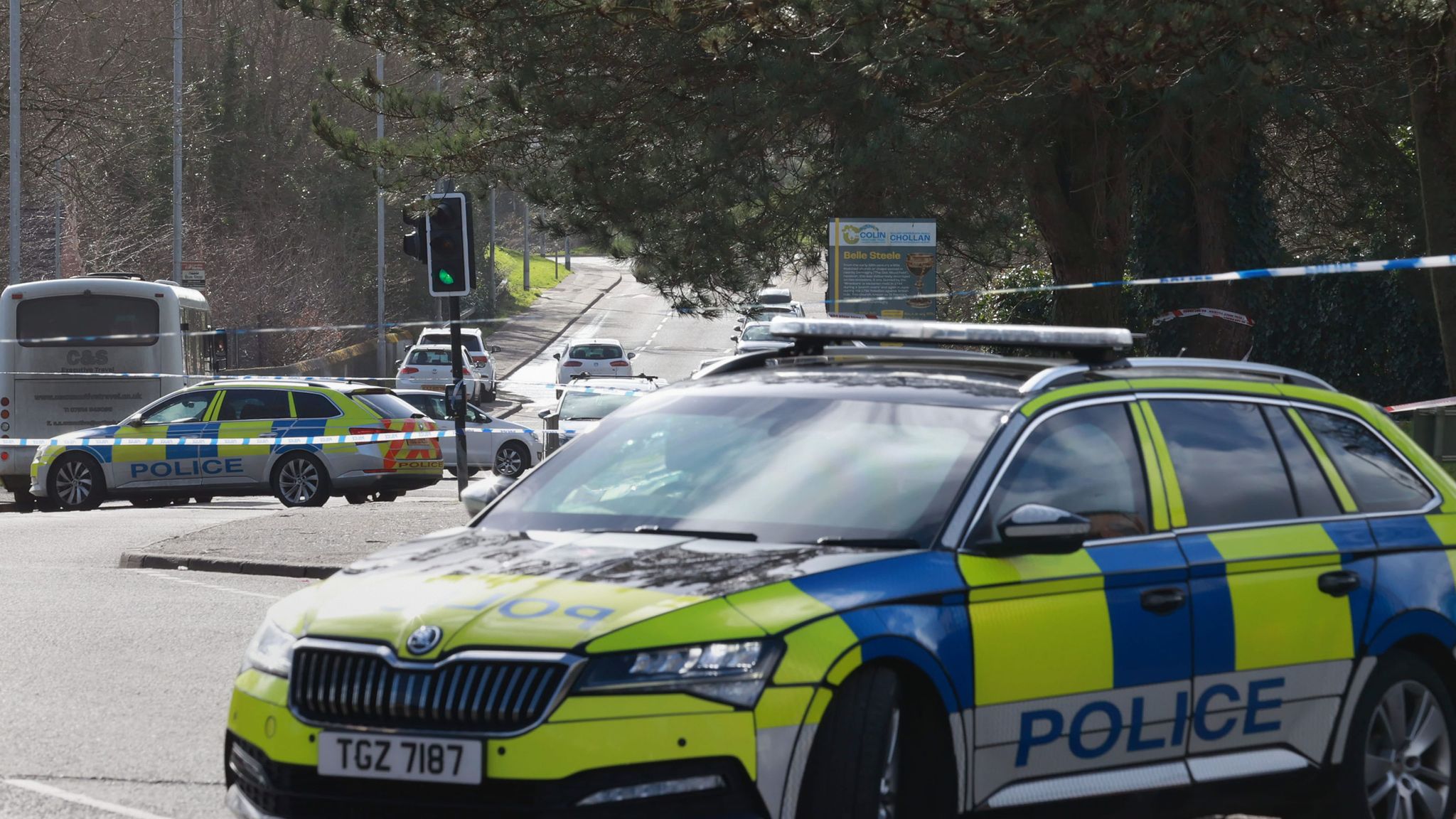 Taxi driver shot by masked men through car window in west Belfast | UK ...