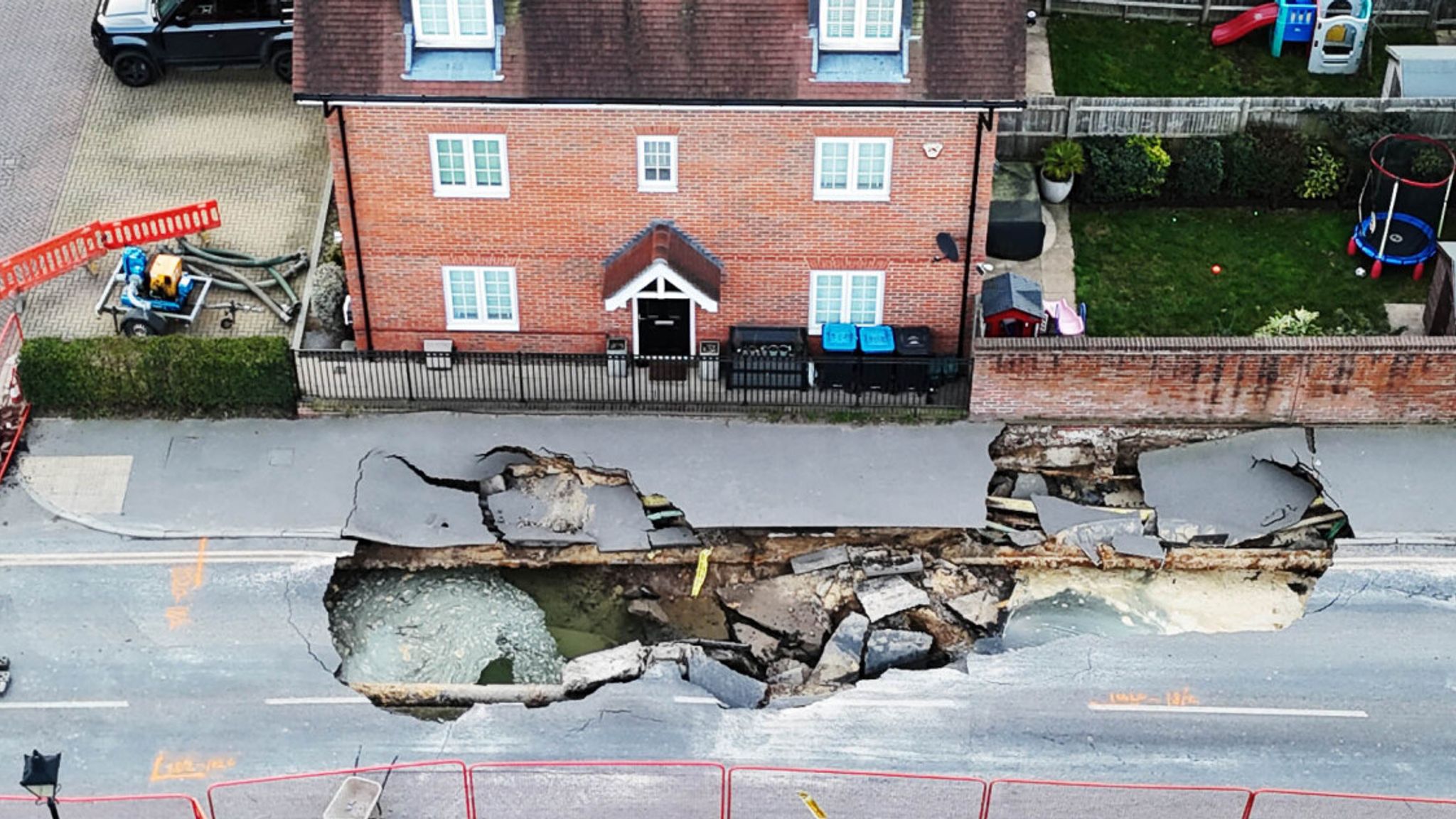 Large sinkhole forces closure of Godstone High Street in Surrey | UK News | Sky News