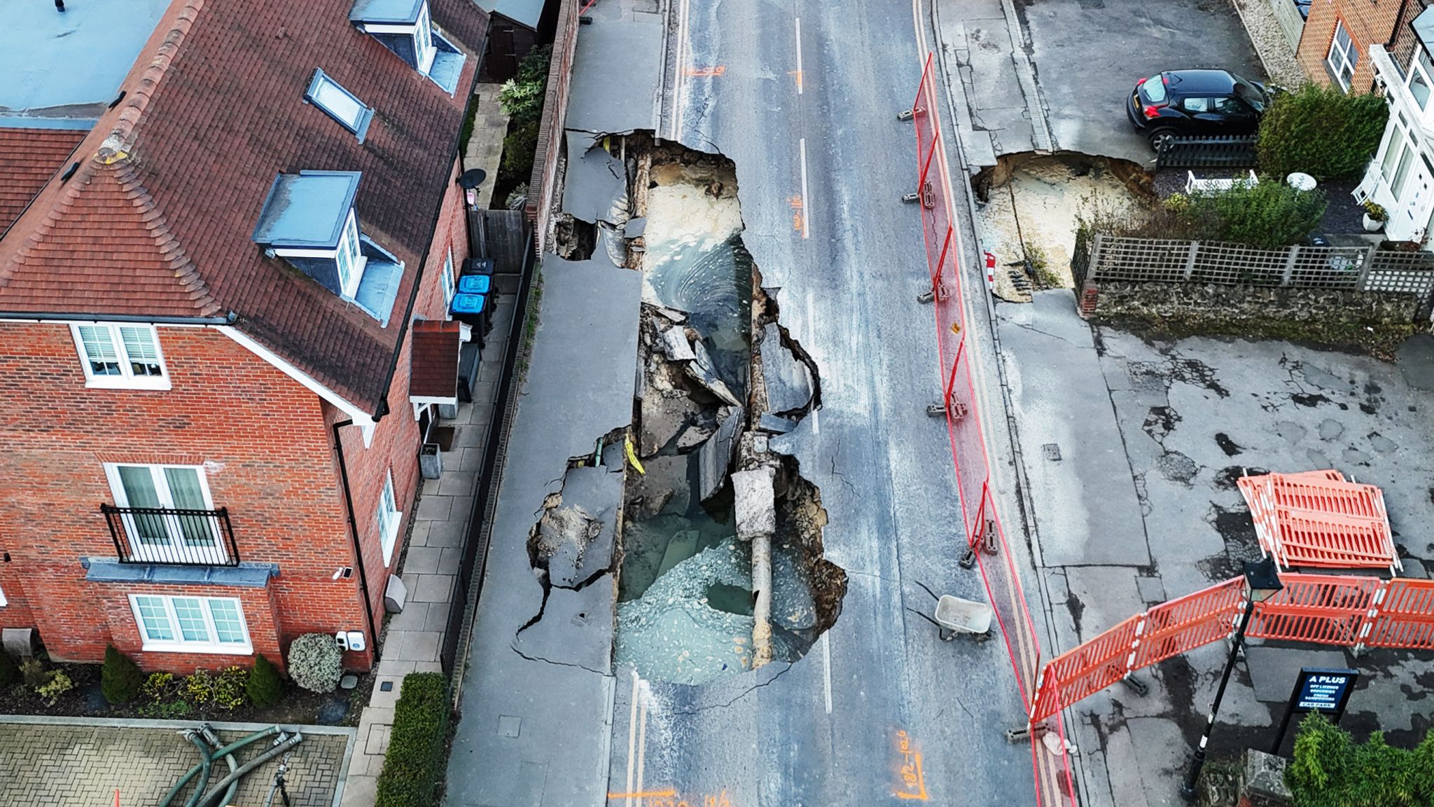 Large sinkhole forces closure of Godstone High Street in Surrey | UK ...