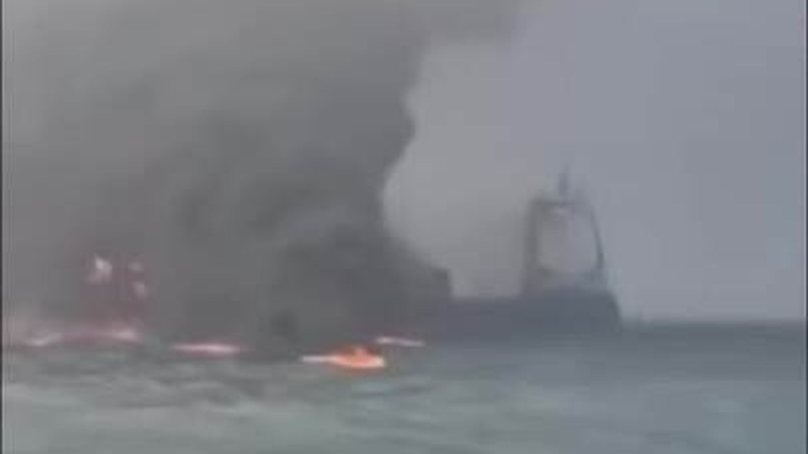 Billowing smoke and fire after oil tanker and cargo ship collision in ...