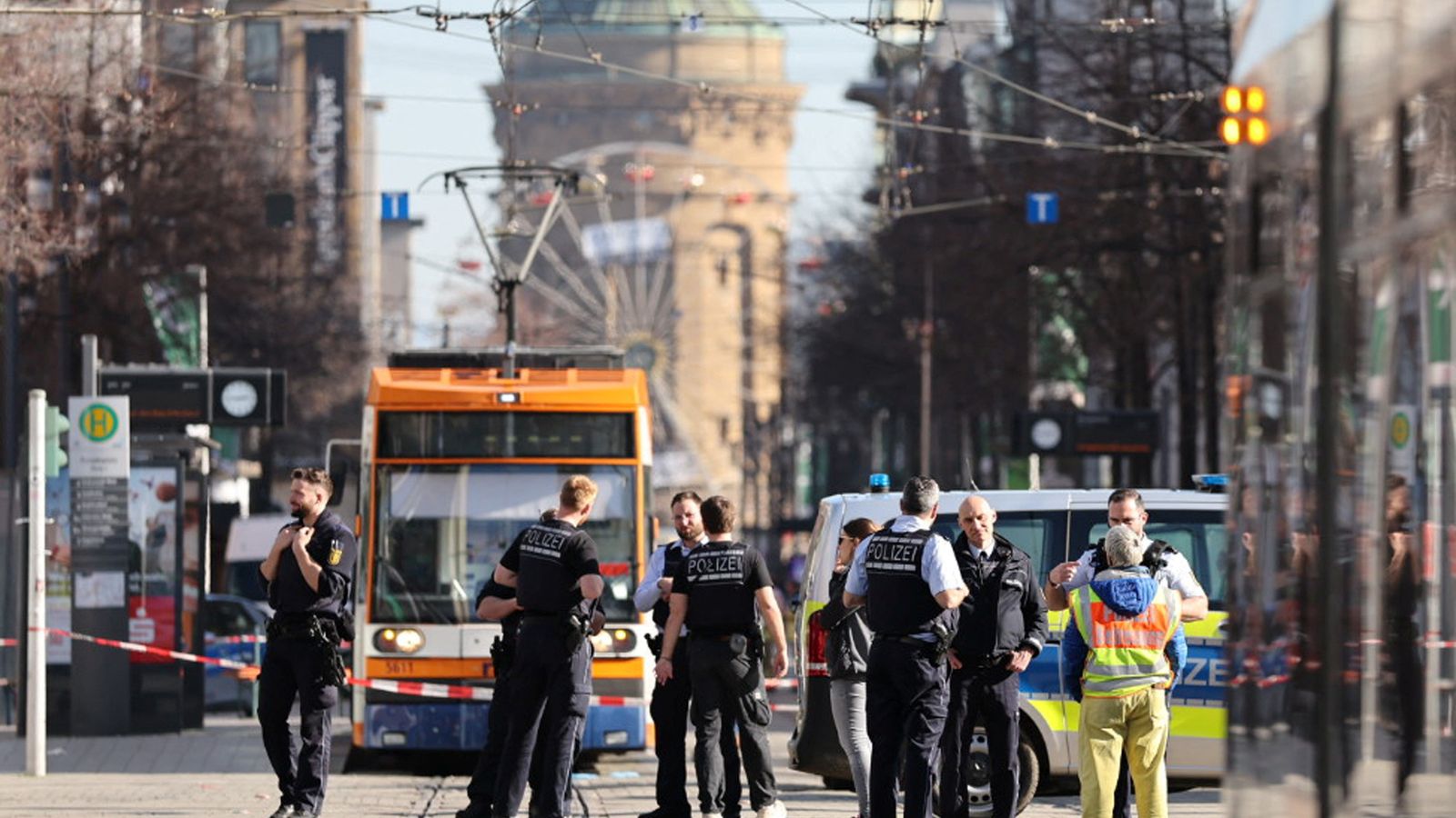 Two dead, 11 injured, as driver rams car into crowds then shoots ...