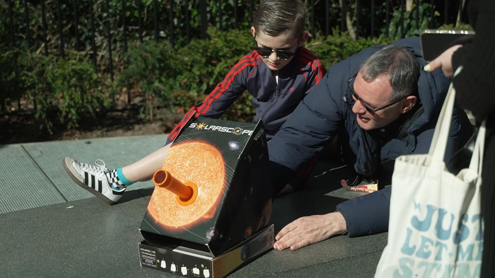 Eclipse chasers in awe as moon takes a nibble from the sun | Science ...