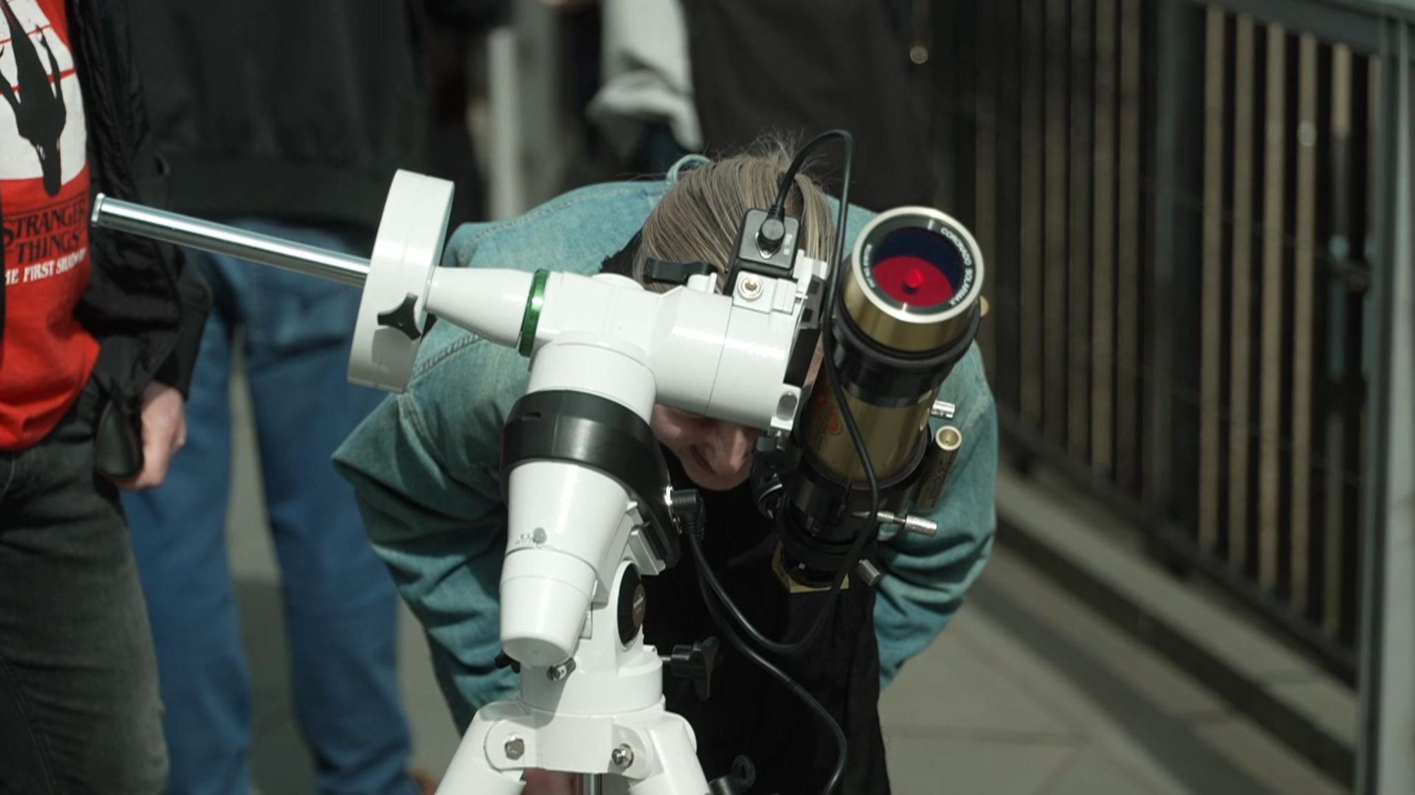 Eclipse chasers in awe as moon takes a nibble from the sun | Science ...