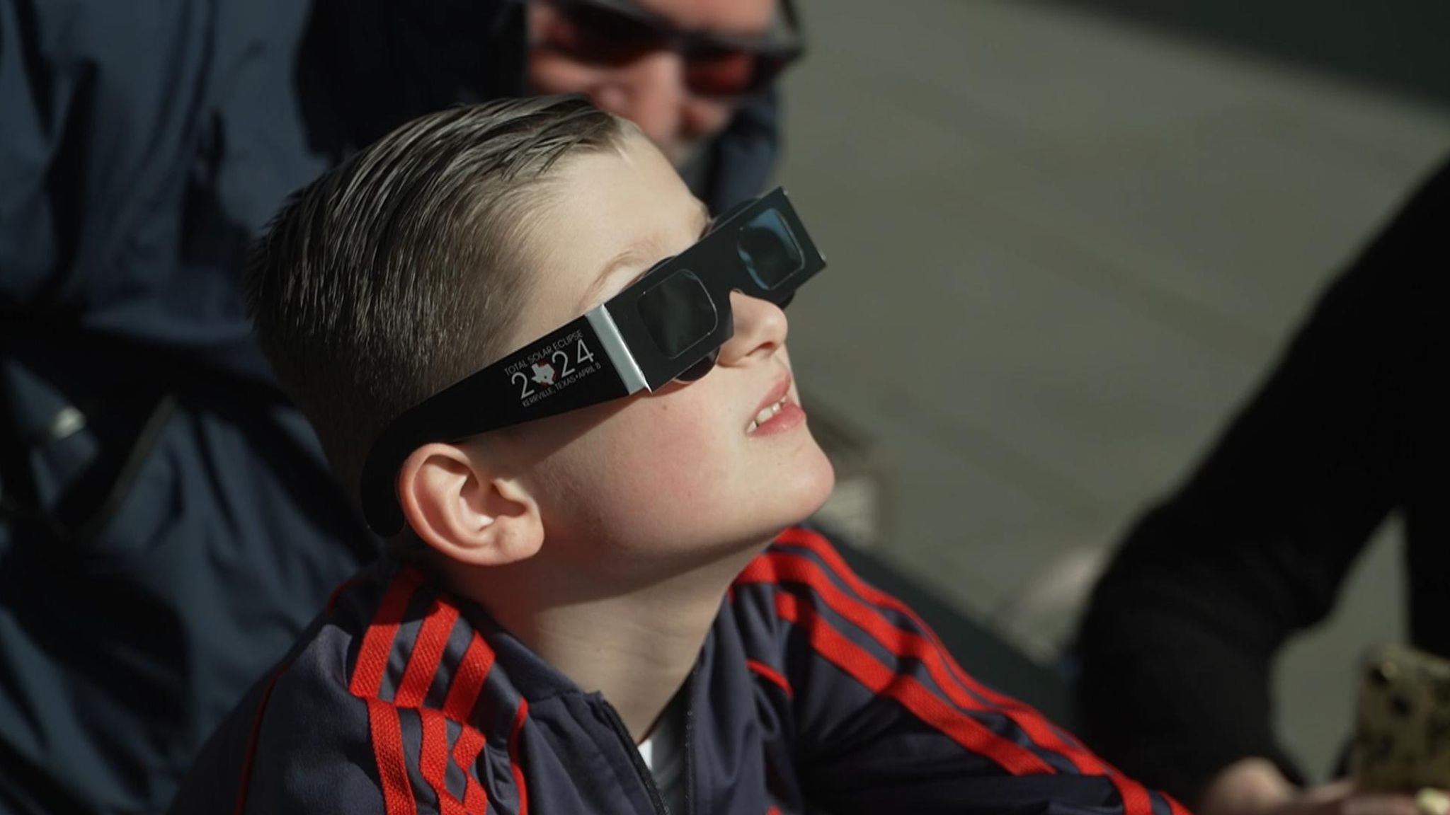 Eclipse chasers in awe as moon takes a nibble from the sun | Science ...