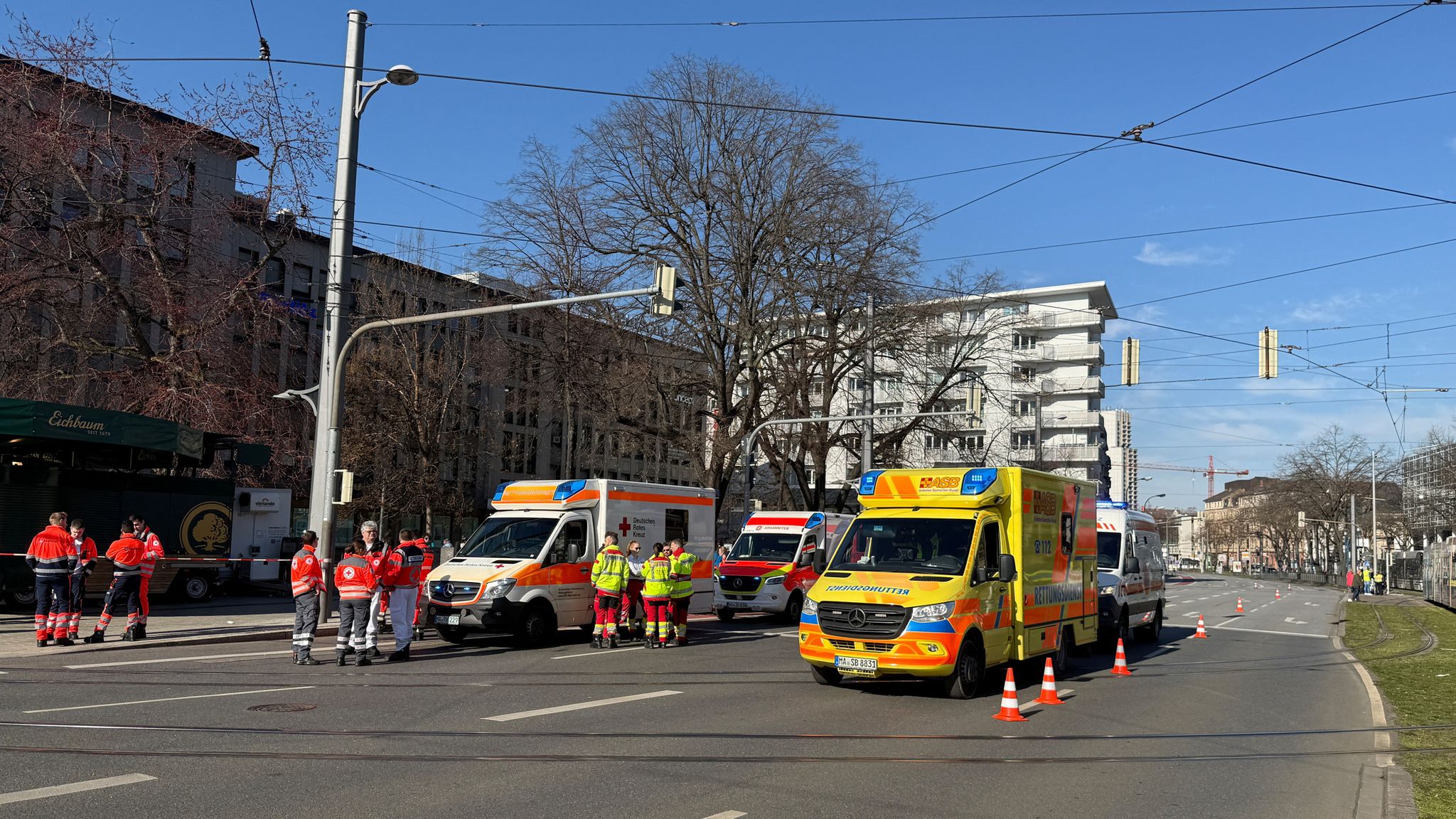 Two dead, 11 injured, as driver rams car into crowds then shoots ...
