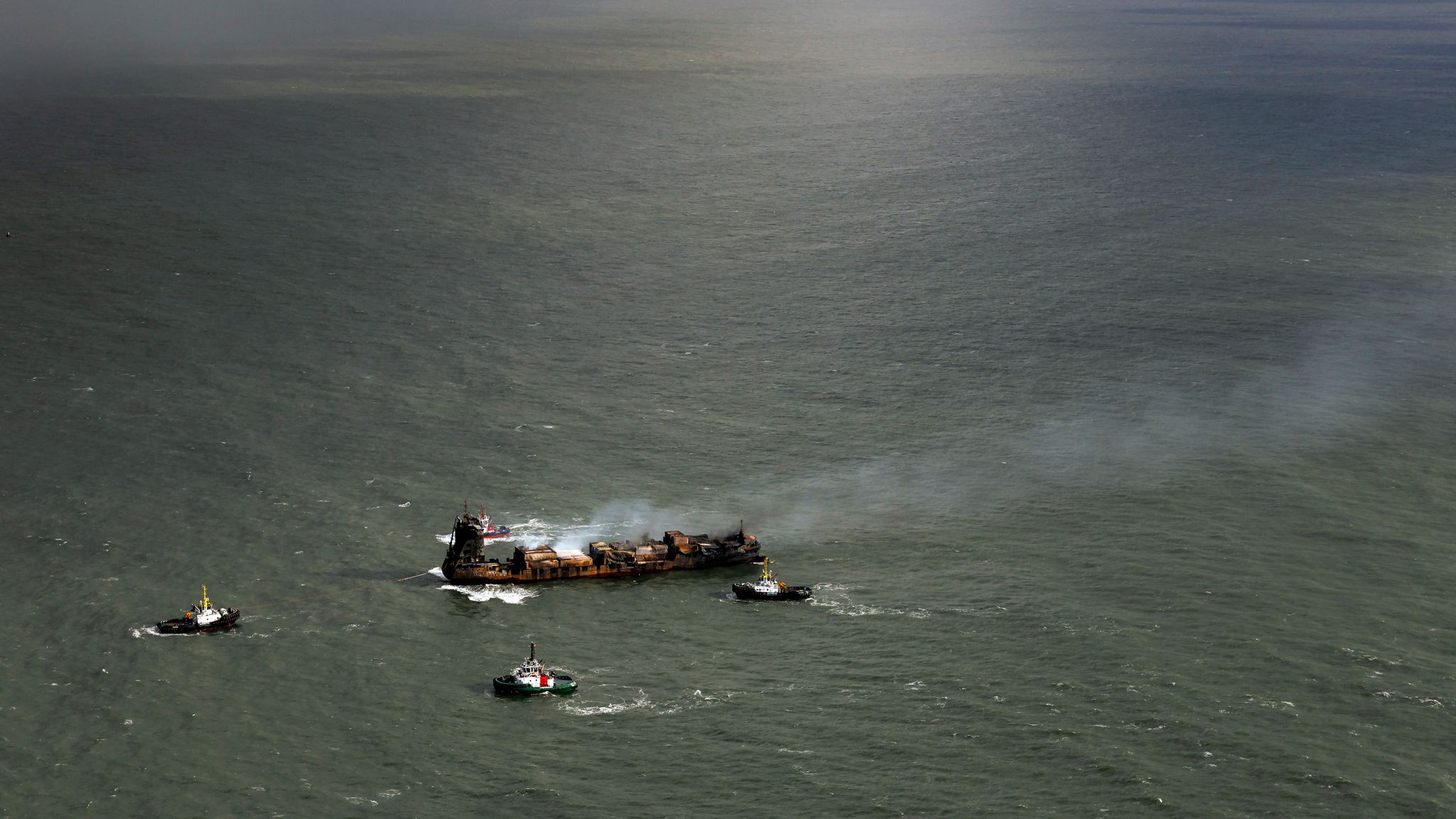 Video shows moment container ship crashes into US oil tanker in North ...