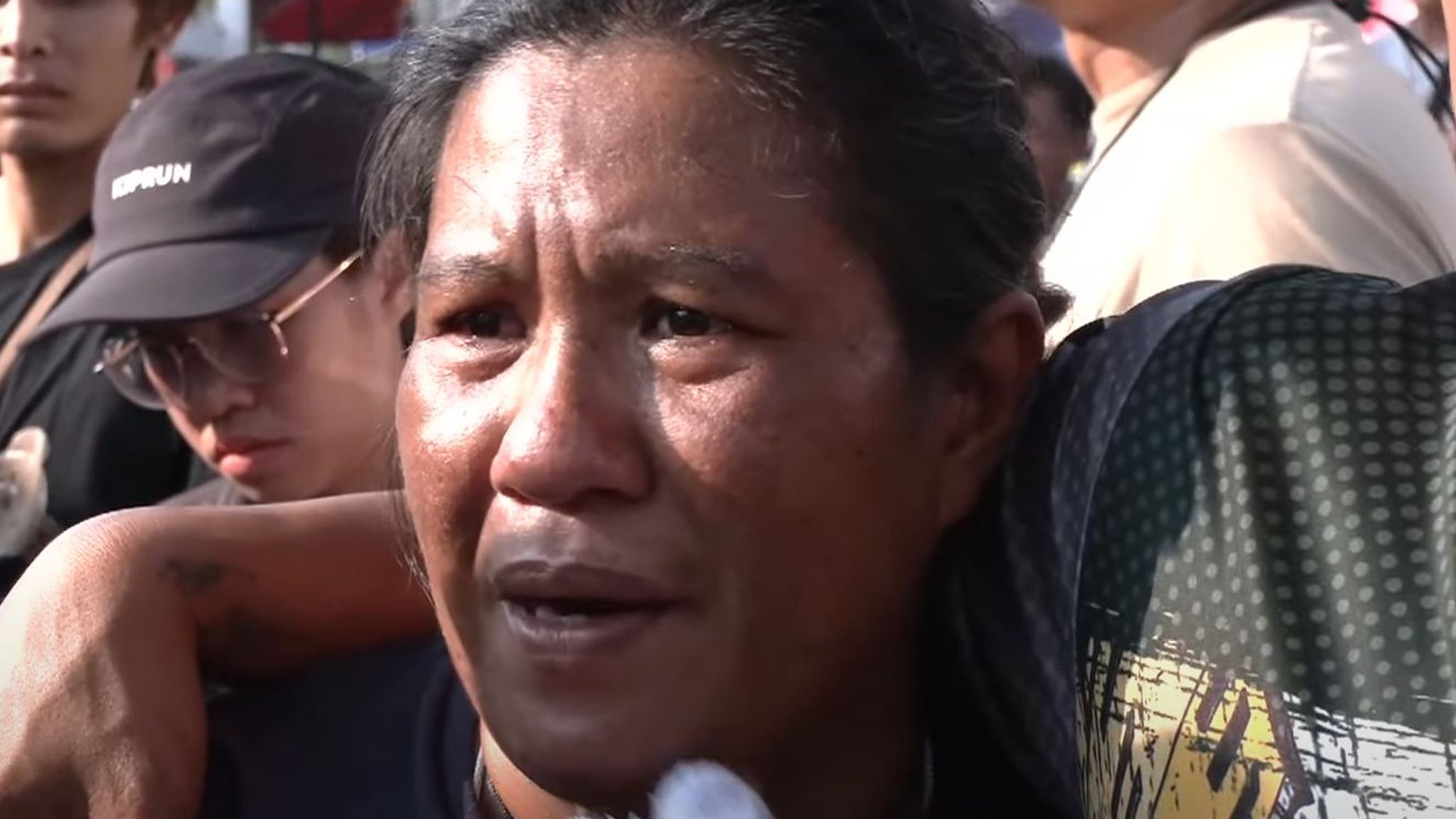Families of those trapped in rubble of collapsed Bangkok building after ...
