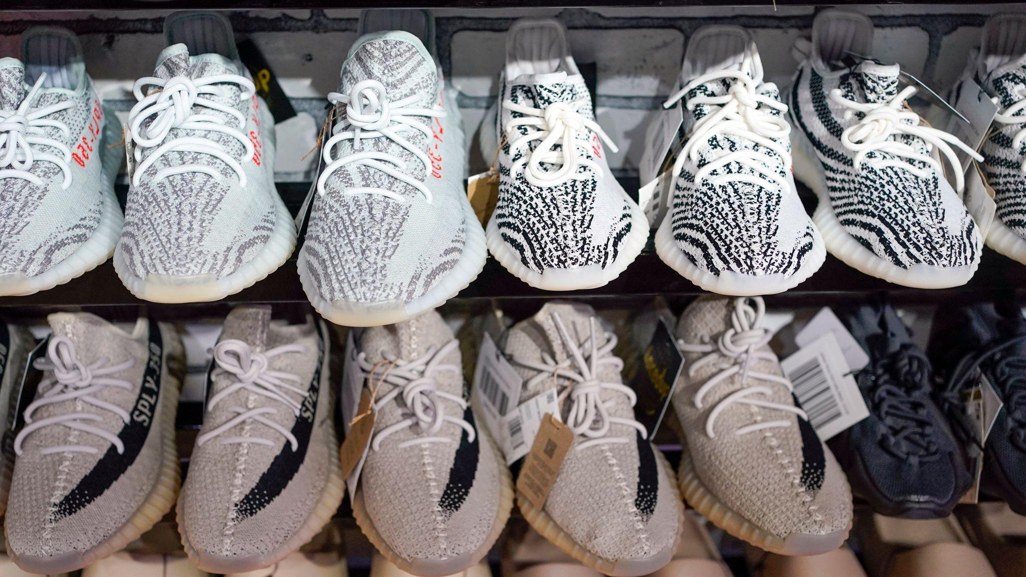 Adidas sells final pair of Yeezy trainers - years after cutting ties ...
