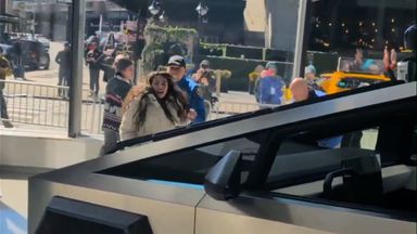 Protesters arrested after occupying Tesla showroom | US News | Sky News