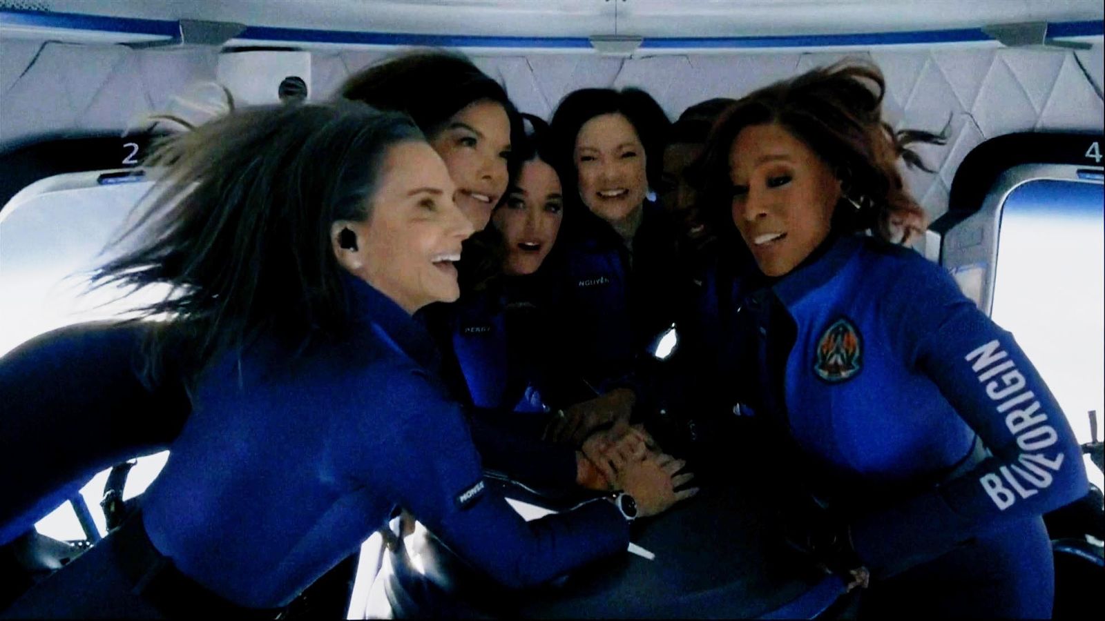 Footage captured by Blue Origin shows the all-female crew, including Katy Perry, inside the ...
