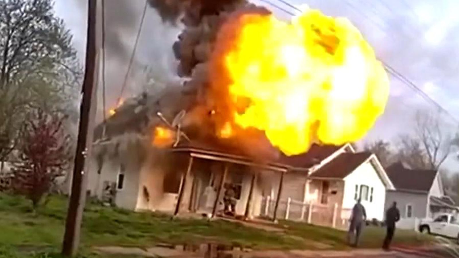 Officers rush to rescue firefighter trapped under rubble after house ...