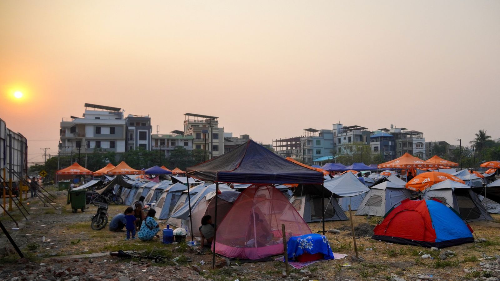 Bodies still remain among the 'collapsed and inclining' buildings in ...