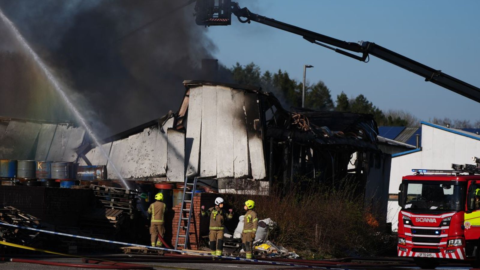 Six people in hospital after huge fire at industrial estate in ...