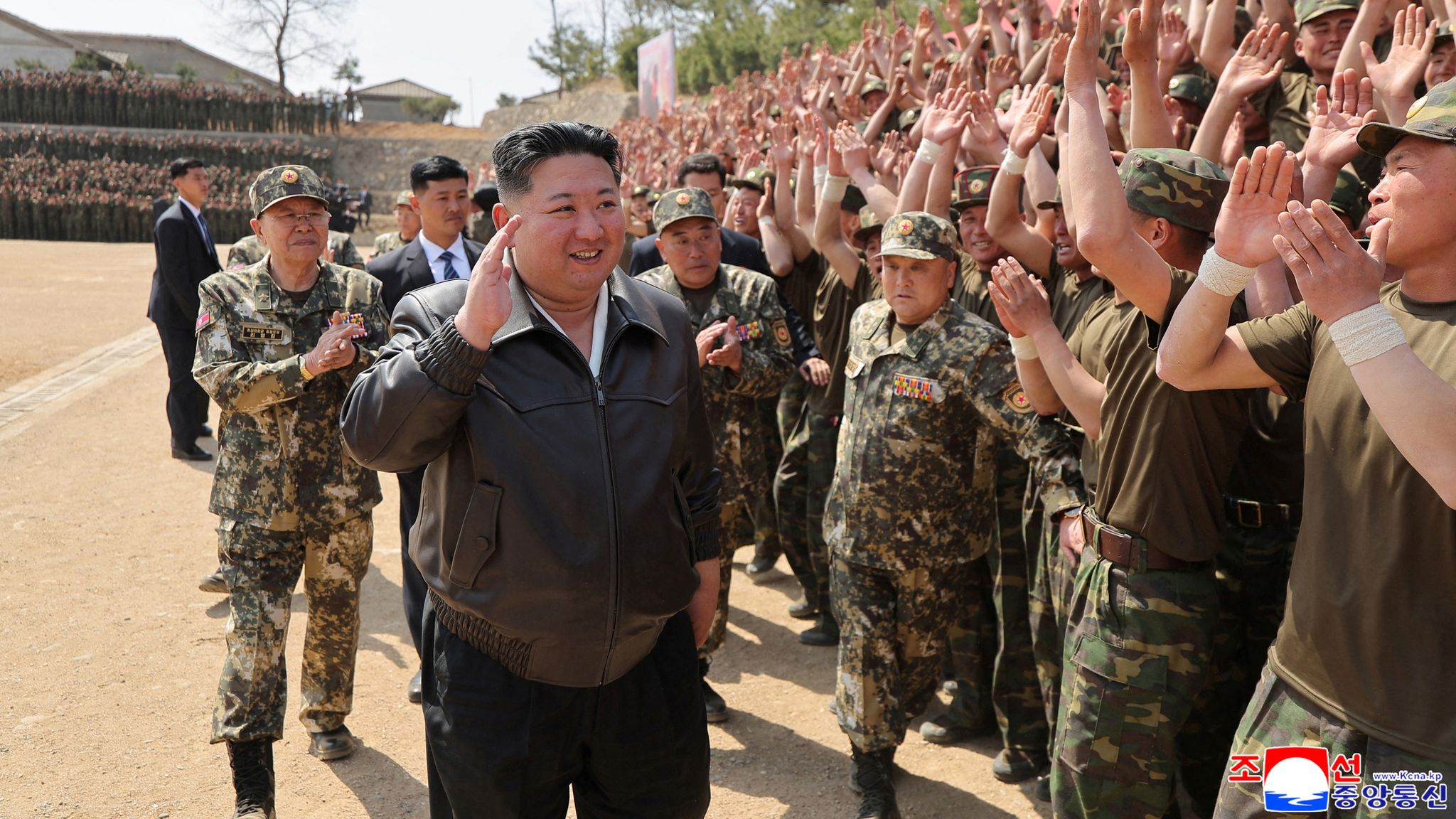 North Korea: Kim Jong Un test-fires 'new sniper rifle' while visiting ...