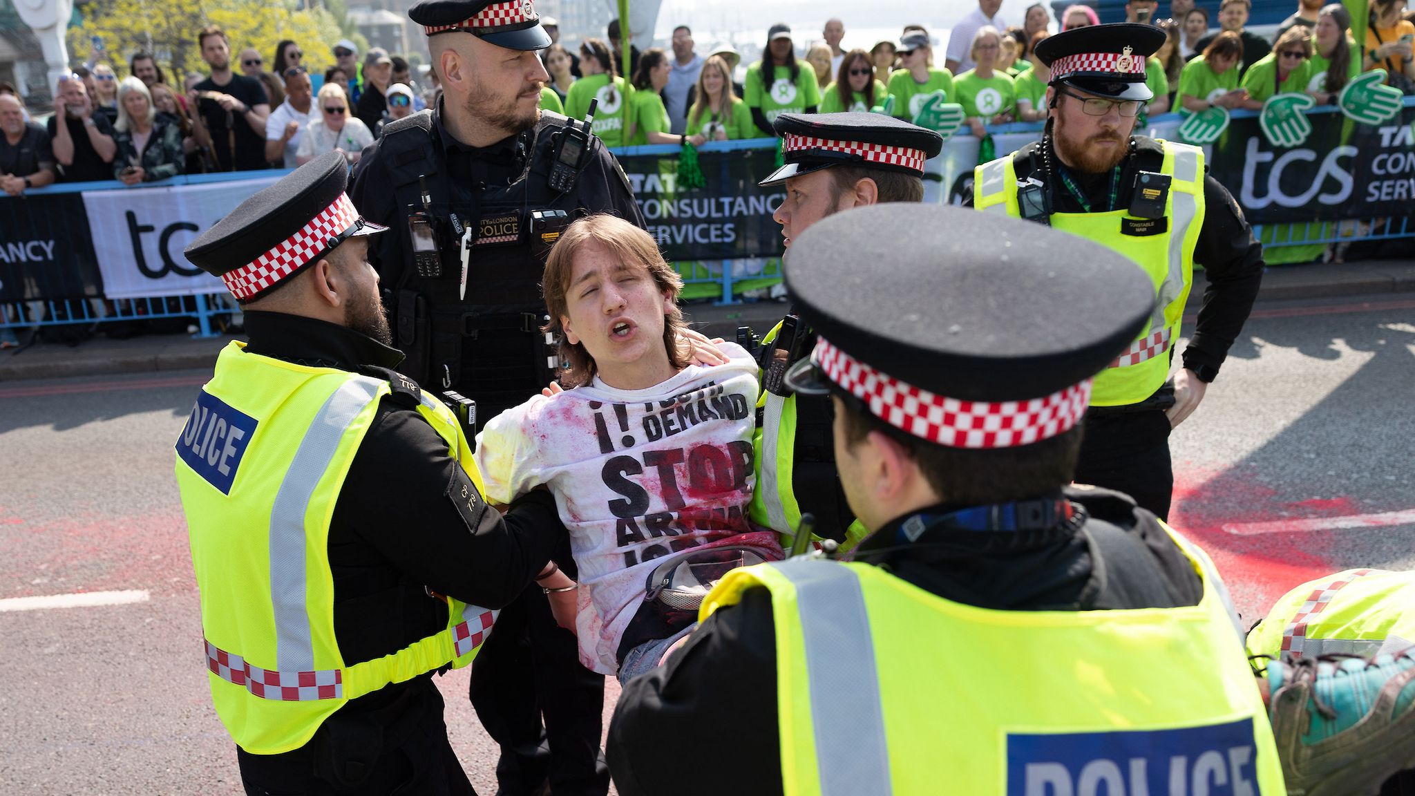 Protesters throw powder on Tower Bridge during London Marathon | UK ...