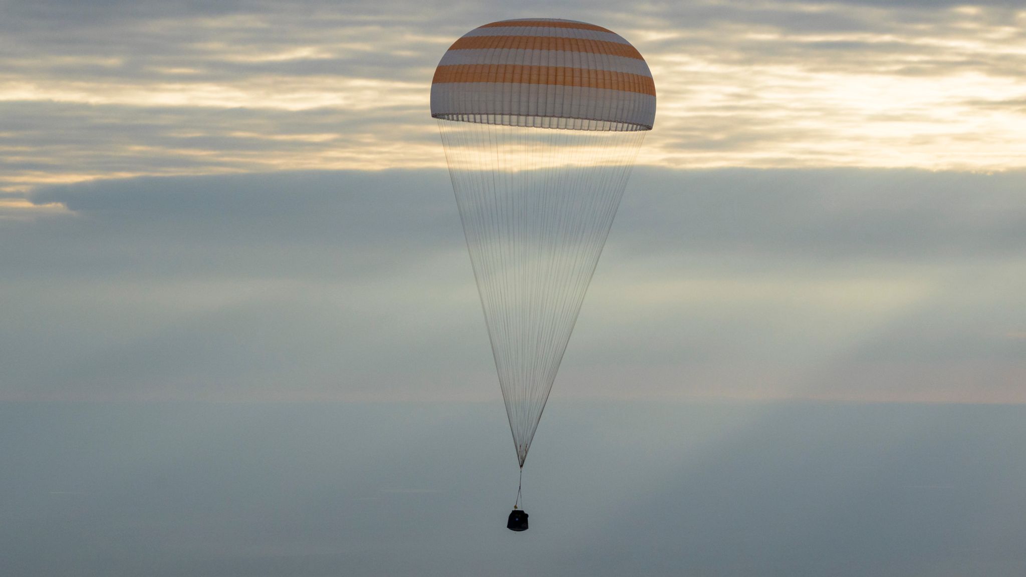 Oldest serving US astronaut returns from space on 70th birthday ...