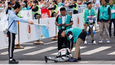 China hosts world's first half-marathon race between humans and robots ...