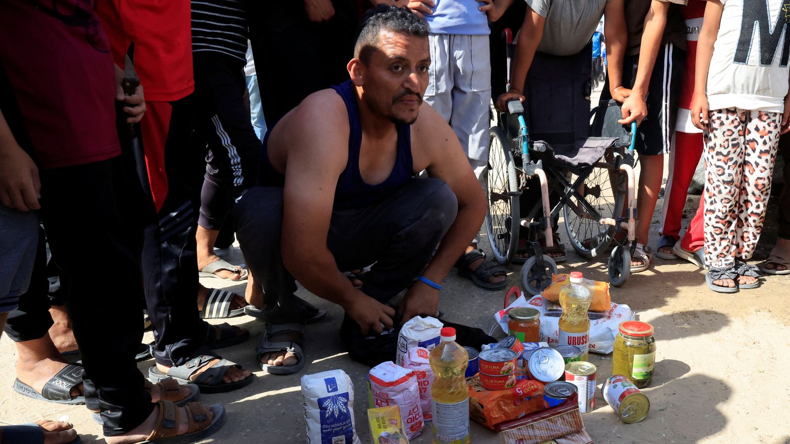 Palestinians flock to Gaza aid centres despite concerns - as lawyers ...