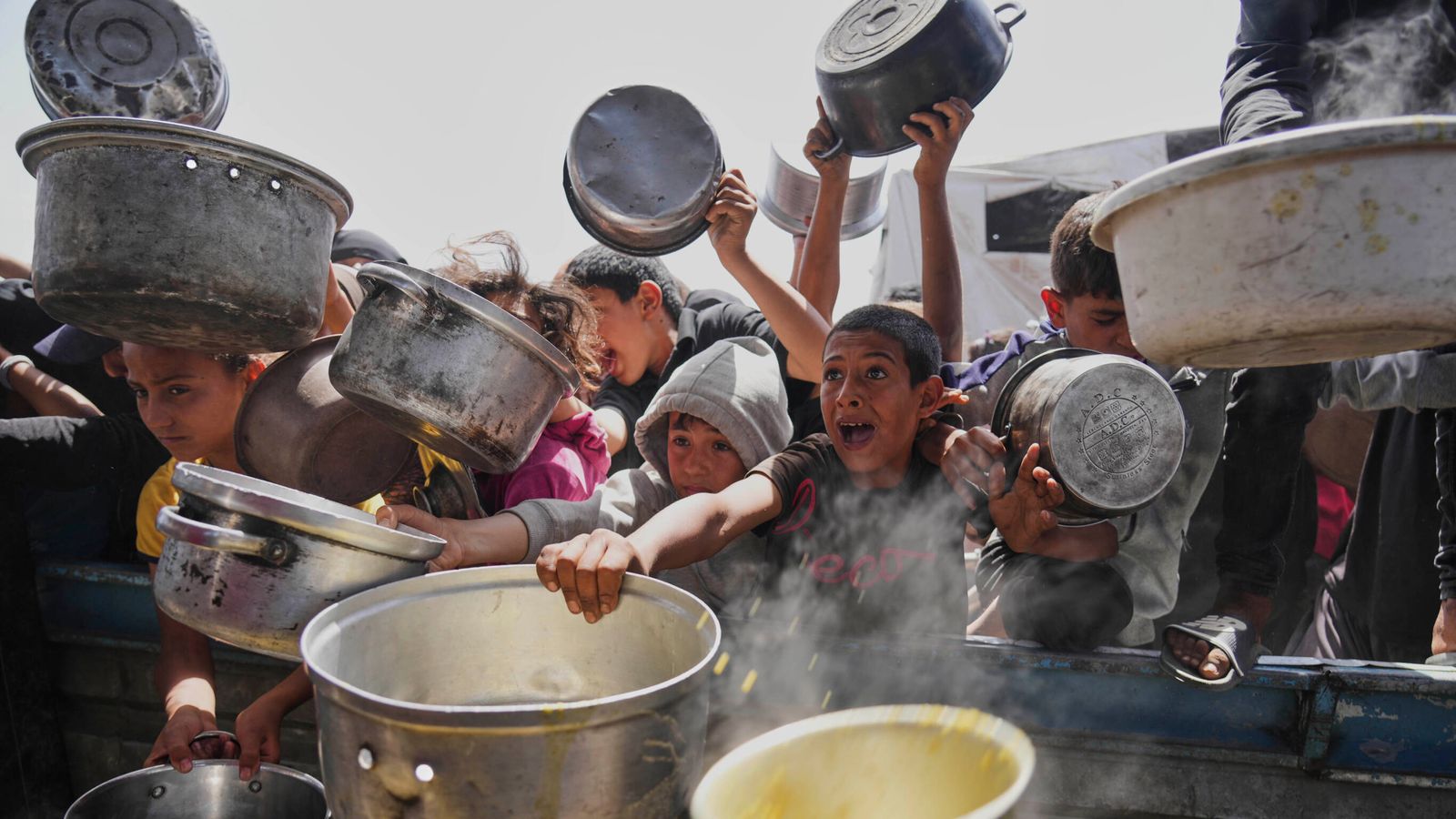 Israel-Hamas war: Families scramble for food in Gaza as aid blockade nears two months | World ...