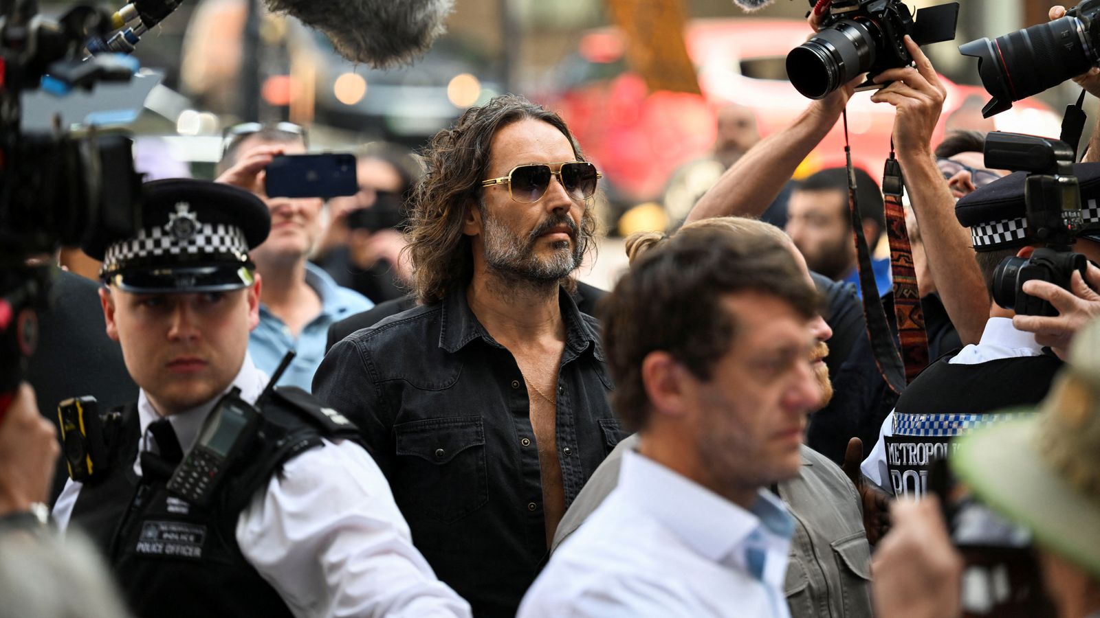 Russell Brand in court to face rape and sexual assault charges | News UK Video News | Sky News