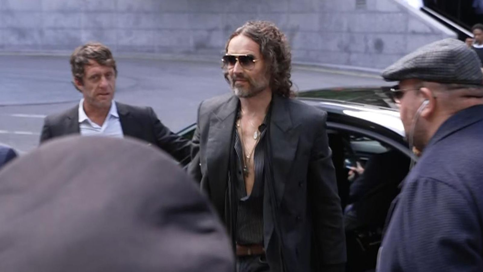 Russell Brand: Comedian and actor pleads not guilty to rape and sexual ...