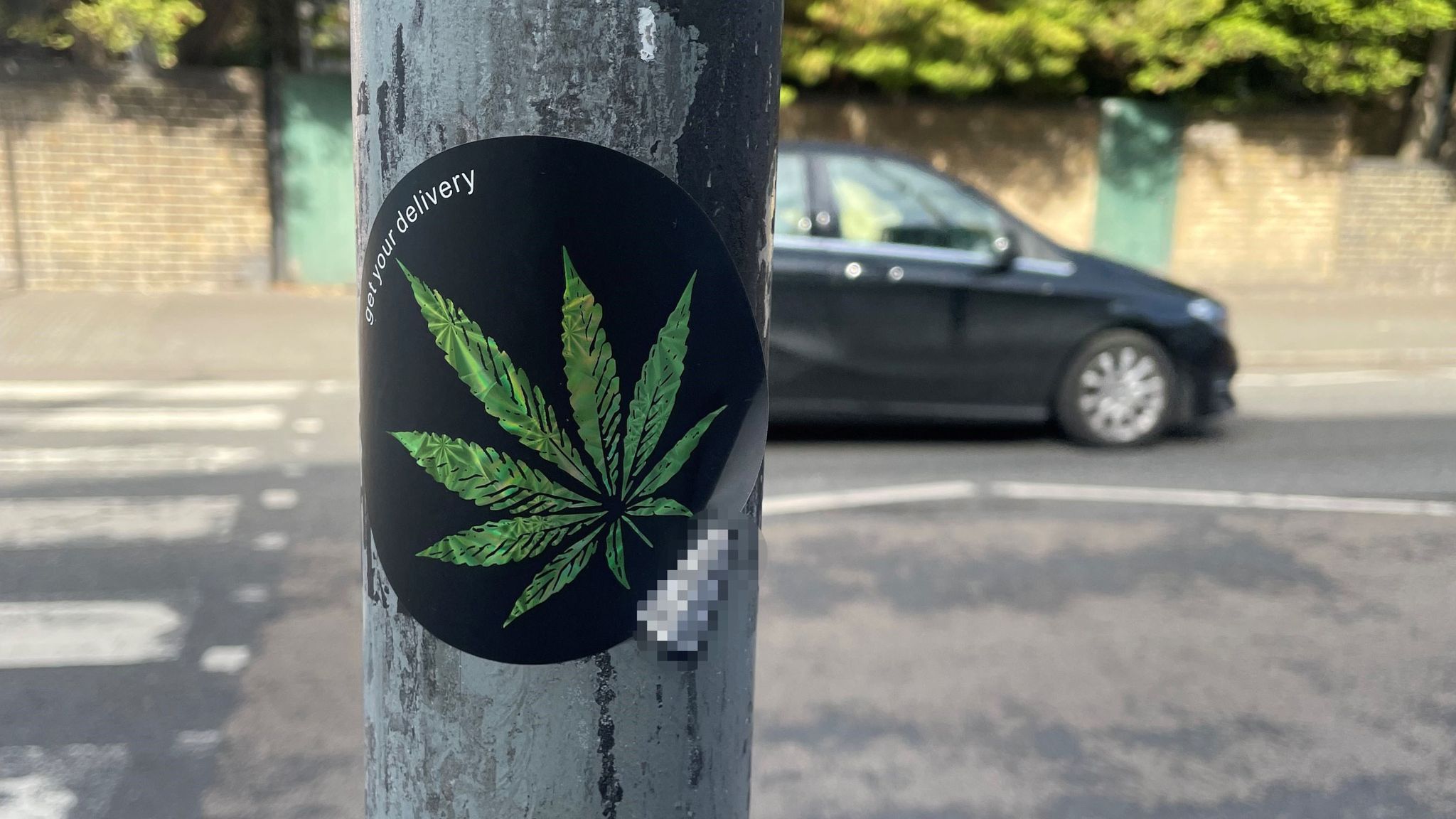 The online drug trade behind QR code stickers plastered on streets ...