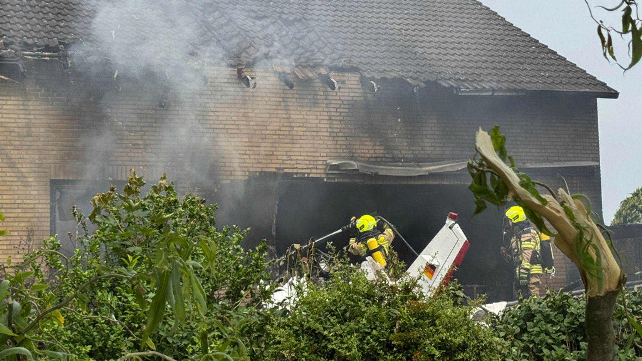 Two people die after small plane crashes into house in Germany | World ...