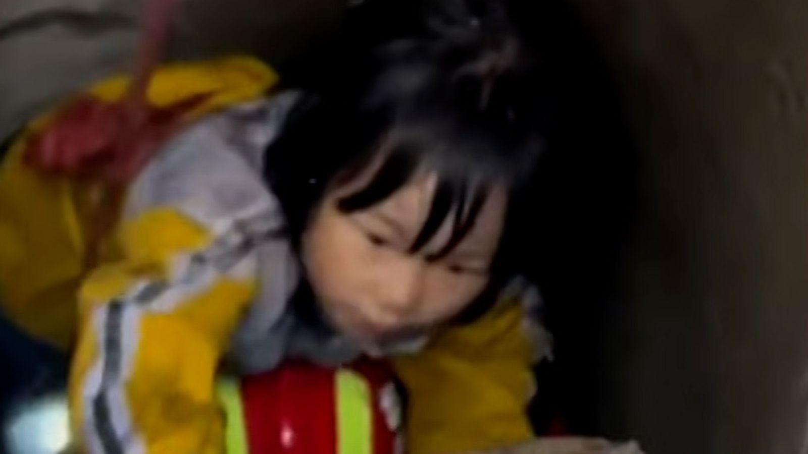 Young girl saved from drain during heavy floods in southwest China | World News | Sky News