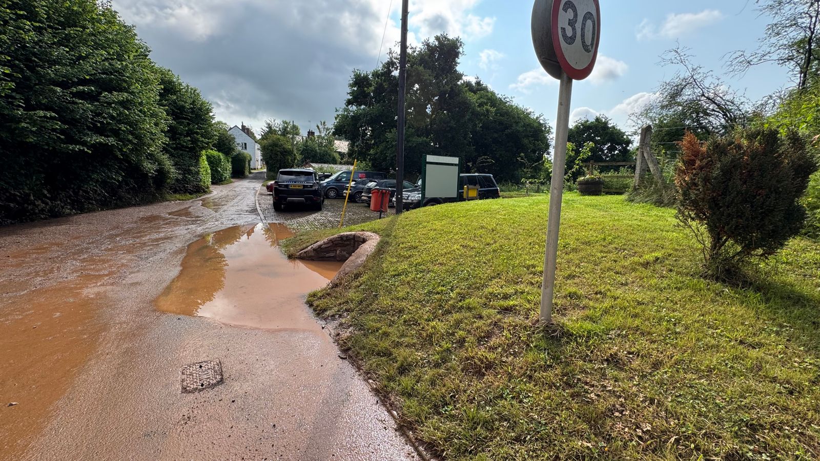 Weather warnings: 30,000 lightning strikes hit UK - with roads flooded ...