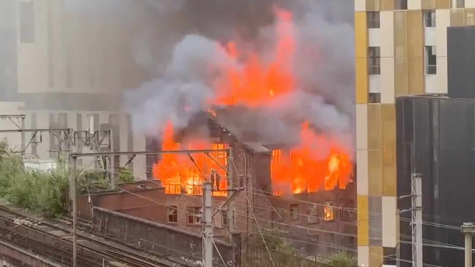 Huge fire rips through Manchester's historic Hotspur Press building ...