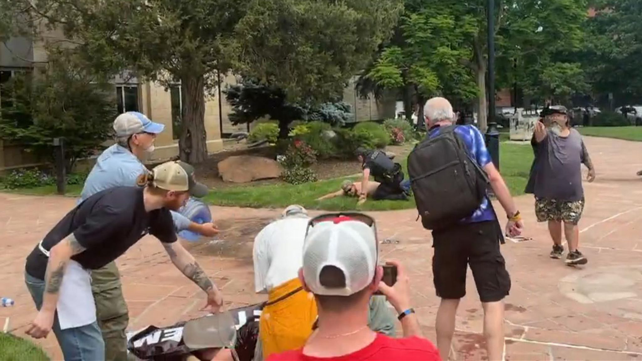 Eight injured in petrol bomb and 'flamethrower' attack at rally for ...