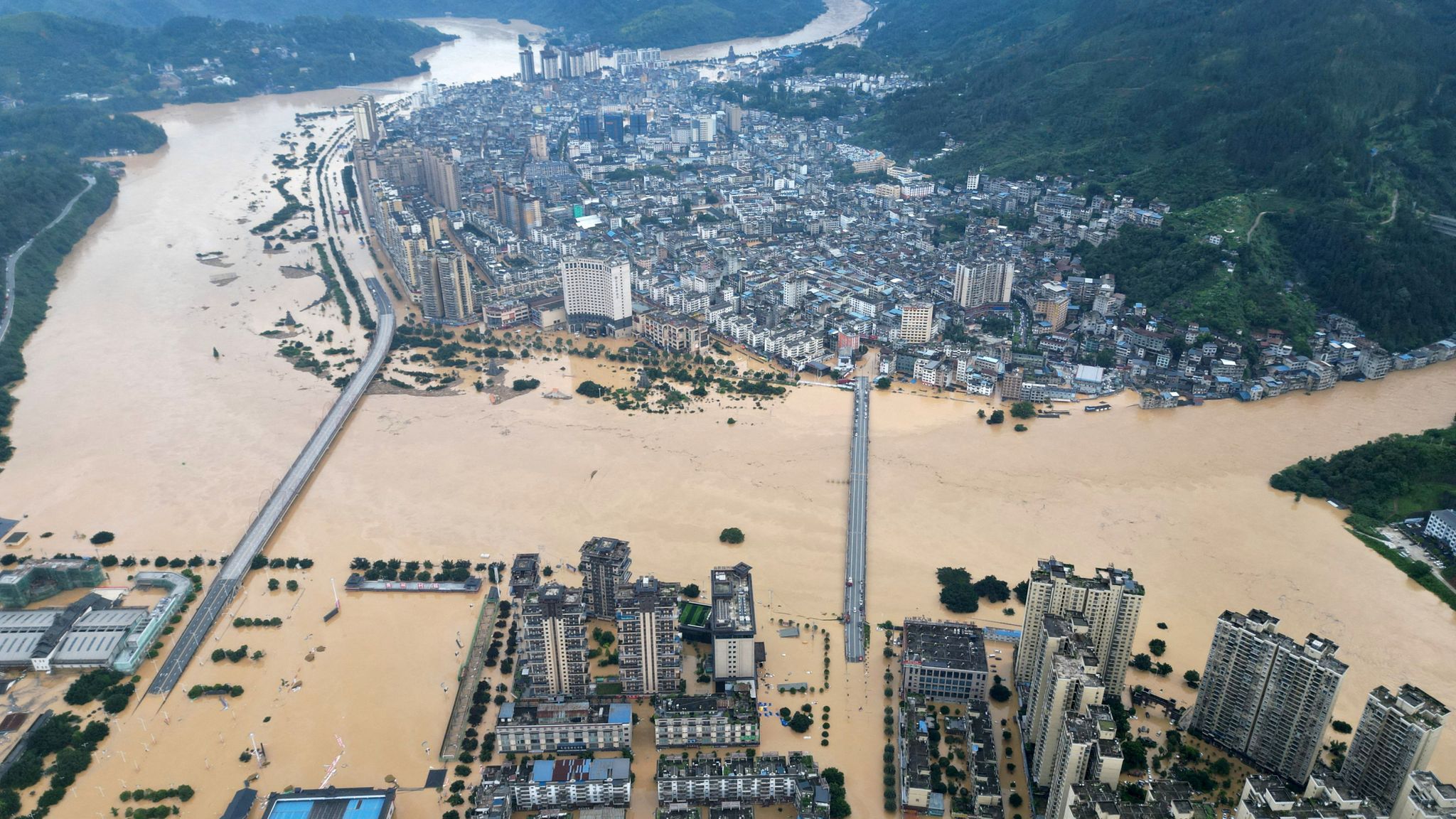 Six killed in China floods as tropical storm threatens further ...