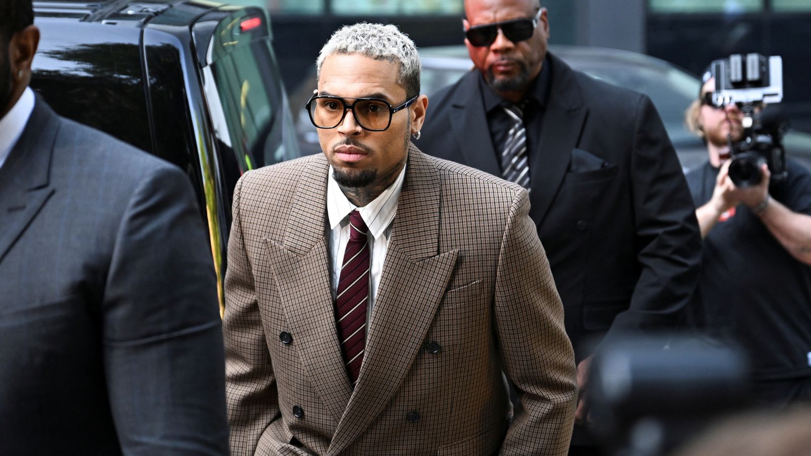 Chris Brown pleads not guilty to lesser assault charge after alleged ...