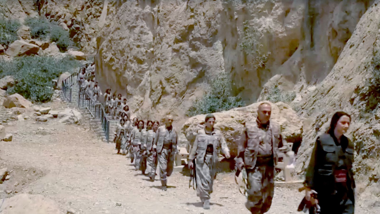 Kurdish fighters burn weapons in significant step towards peace with ...