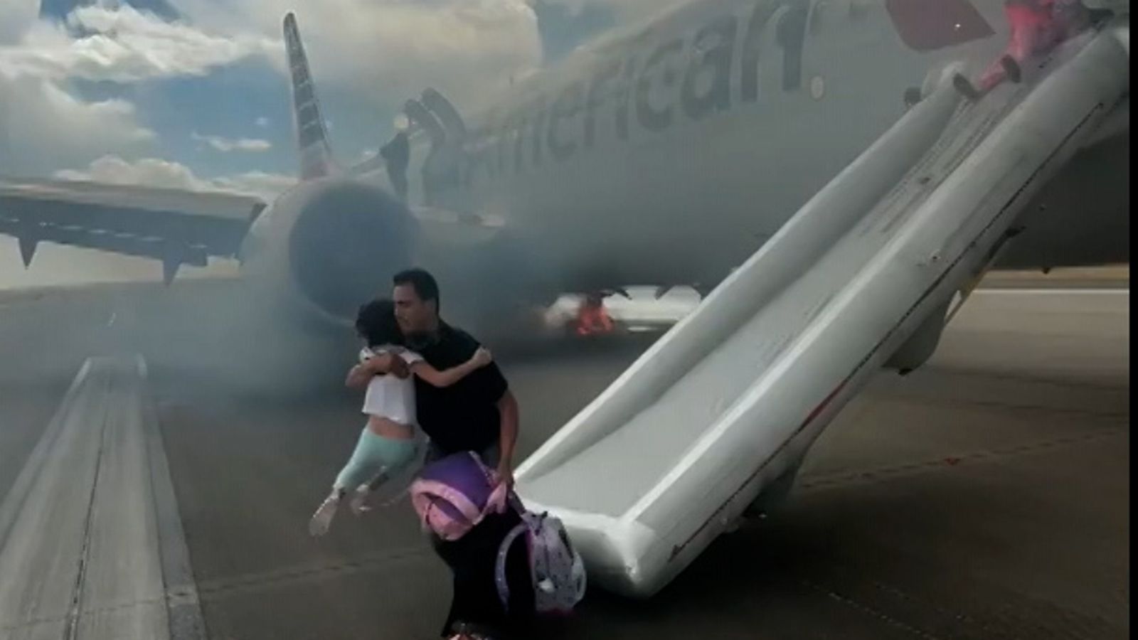 Denver flight evacuated using emergency slide | US News | Sky News