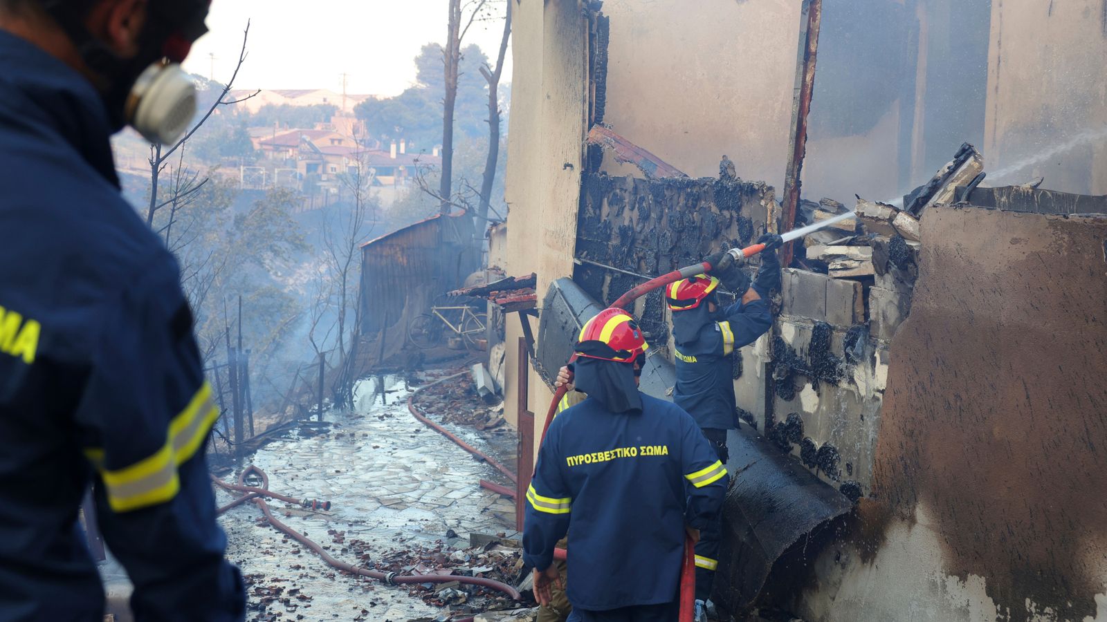 Firefighters tackle blazes as wildfires break out in Greece, Turkey and ...