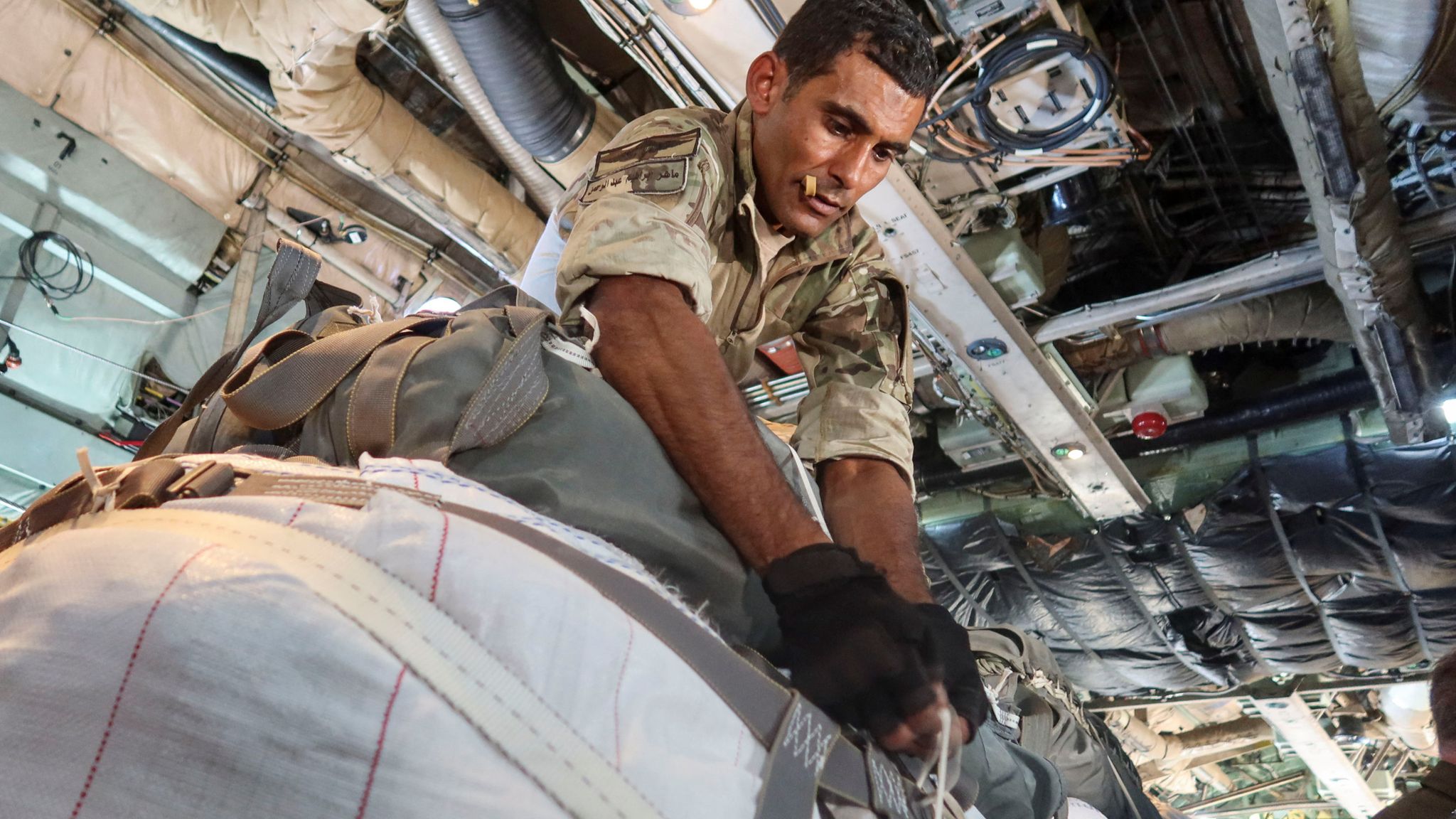 Mile after mile of grey rubble - the view from a plane dropping aid to ...