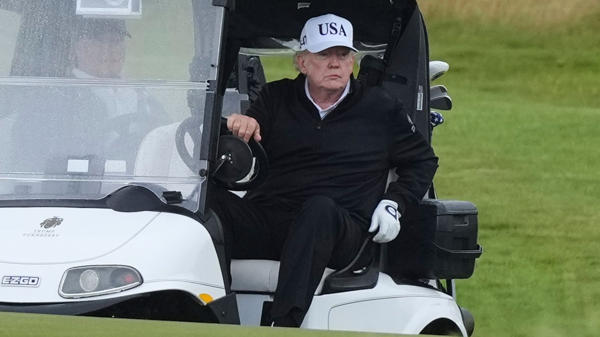 Huge security operation as Donald Trump tees off at his Scottish golf ...